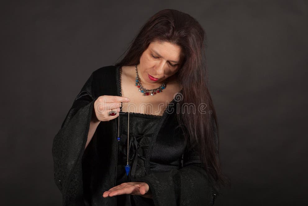 A Woman is Working with a Pendulum Stock Image - Image of esotericism ...