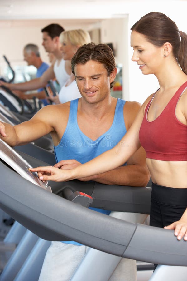 Working Out With Personal Trainer Stock Photo - Image of couple, adult ...