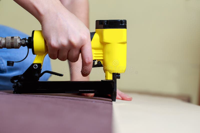 Woman Working with Pneumatic Stapler Stock Photo - Image of ...