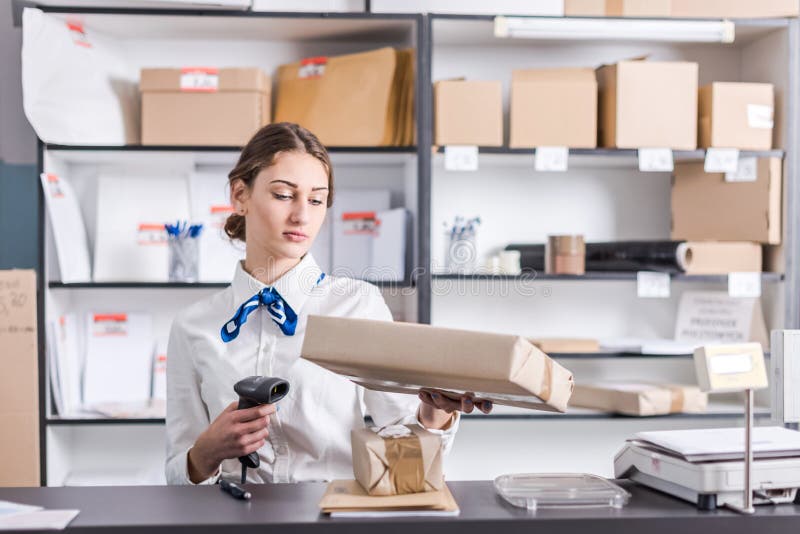 Woman Working at the Post Office Stock Photo - Image of cardboard ...