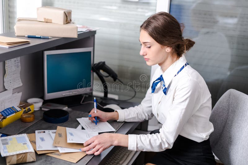 Woman Working at the Post Office Stock Photo - Image of lady, holding ...
