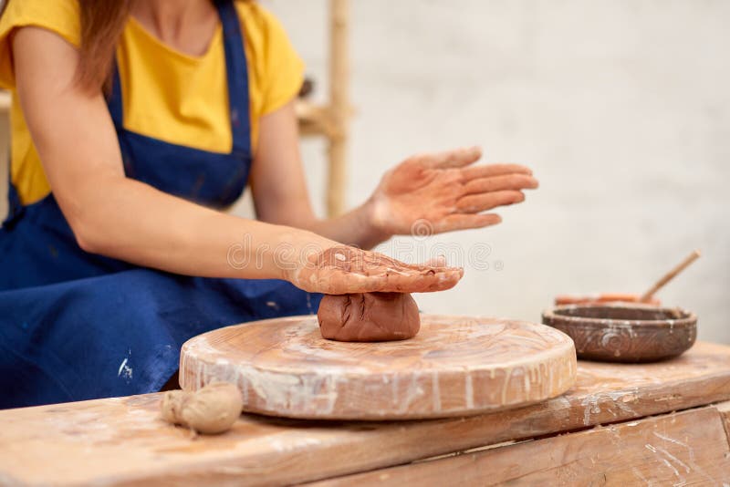 Woman Working on Potter`s Wheel. Artisan Making Clay Pot Stock Image ...