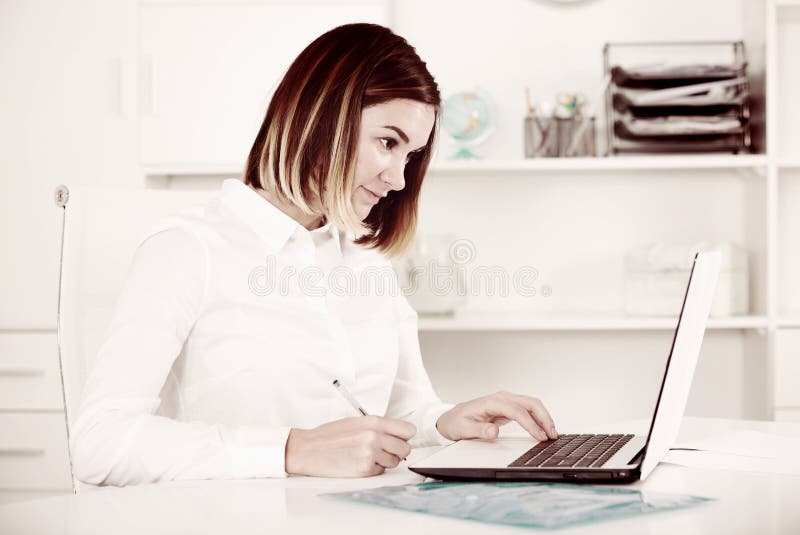 Woman working productively stock photo. Image of effective - 83835062