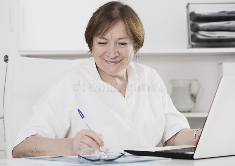 Woman working productively stock image. Image of industrious - 85719321