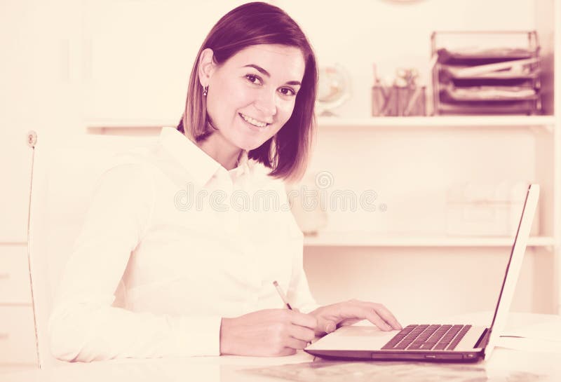 Woman working productively stock image. Image of female - 92674787
