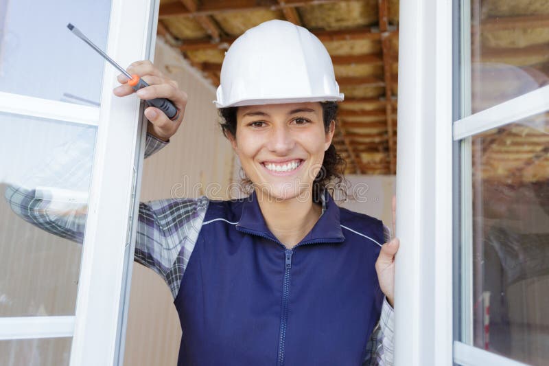 Woman Working with Screwdriver Stock Image - Image of window, fastening ...
