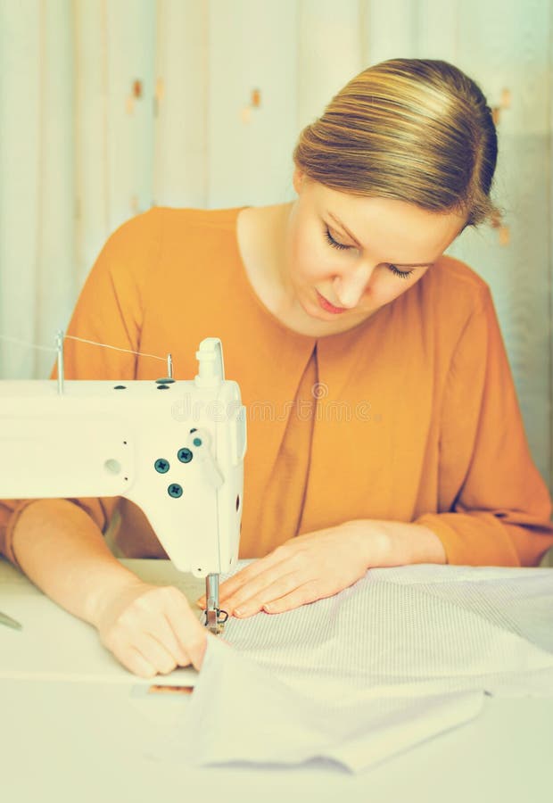 Woman Working on Sewing Machine in the Factory. Stock Image - Image of ...
