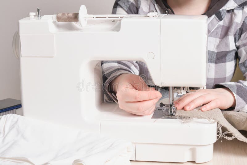 Woman Working with Sewing Machine, White Sewing Machine on the Table ...