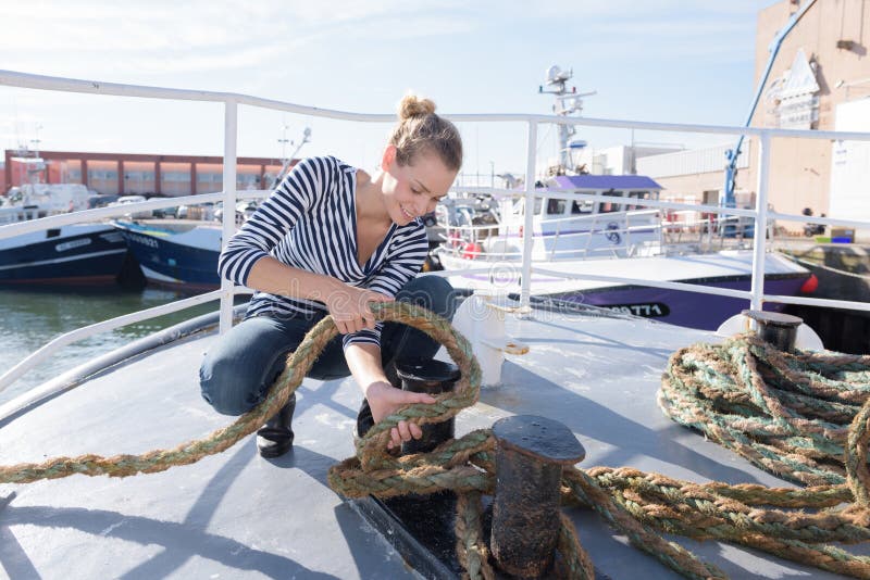 Woman working on ship deck stock image. Image of travels - 279023025