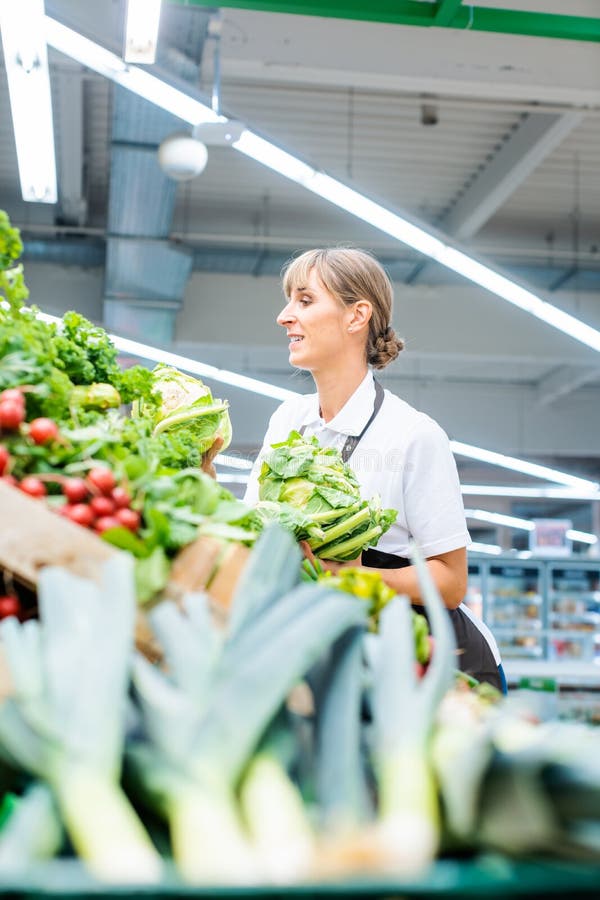 Woman Working in a Supermarket Sorting Fruit and Vegetables Stock Image ...