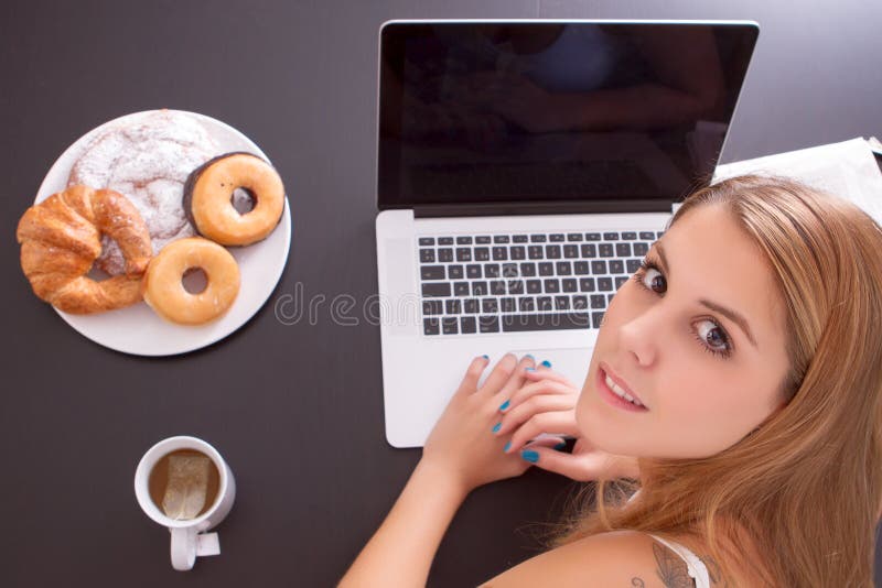 Woman Working on a Table with a Laptop Stock Photo - Image of relaxed ...