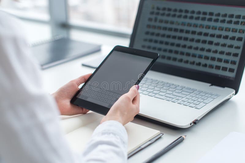 Woman Working with Tablet Pc and Laptop Computer on Table Stock Photo ...