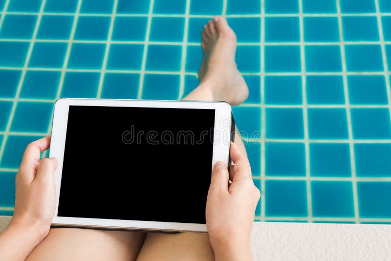 Woman Working with Tablet Sitting at Swimming Pool Stock Photo - Image ...