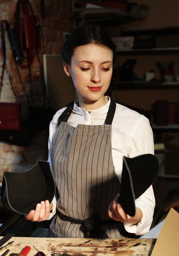 Woman Works in a Bag Making Studio, Cuts Out Details Stock Photo ...