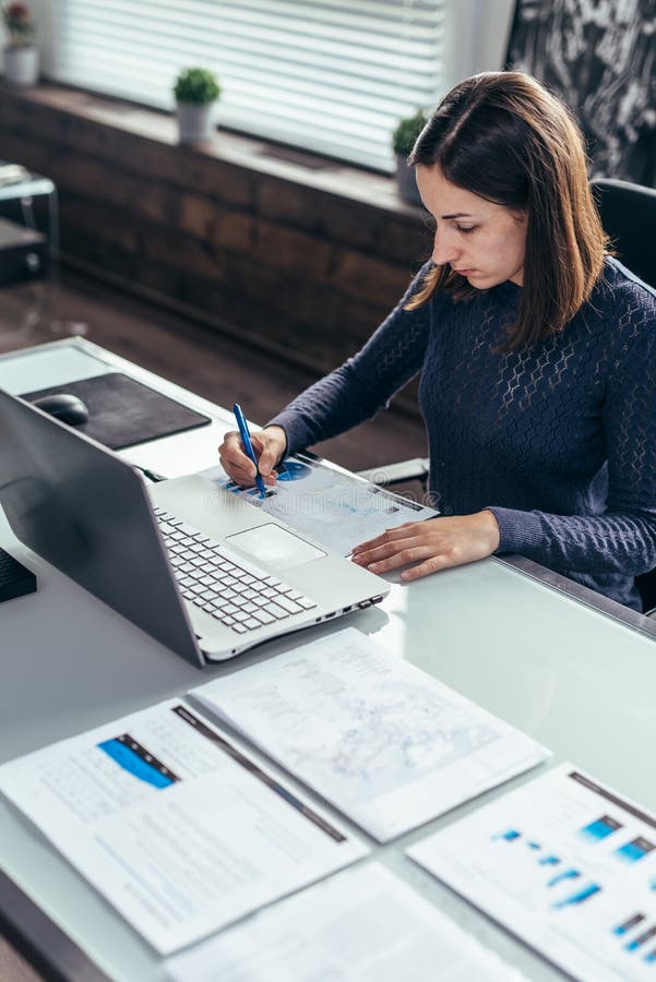 Woman Works with Documents Sitting at Table Stock Photo - Image of ...