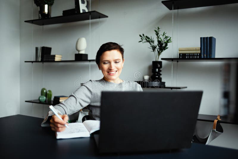 A Woman Works at a Computer in the Home Stock Image - Image of portrait ...