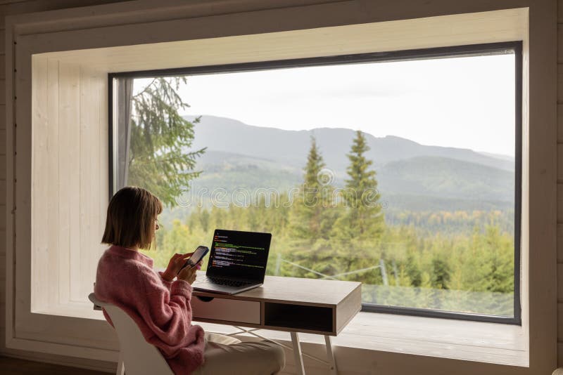 Woman Works on Laptop Remotely in House on Nature Stock Image - Image ...