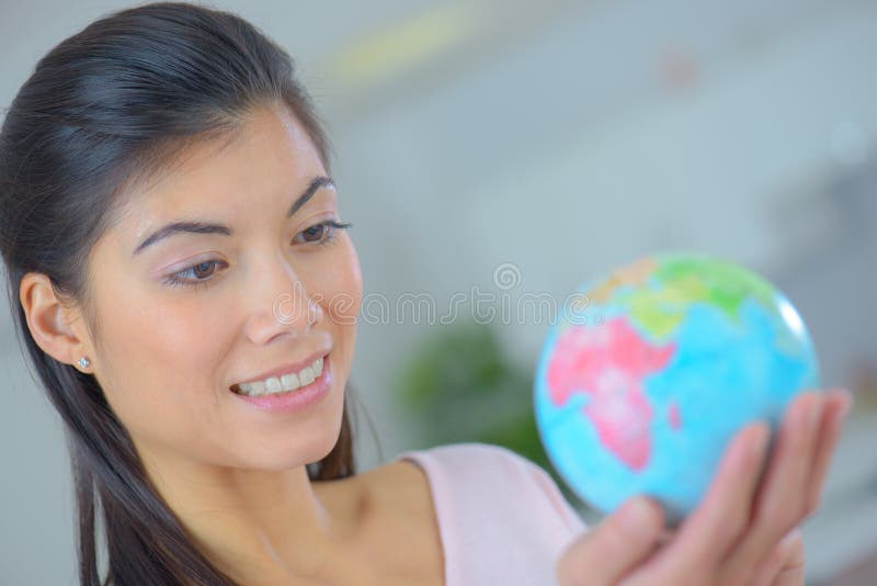 Woman and world in hands stock image. Image of outstretched - 253357863