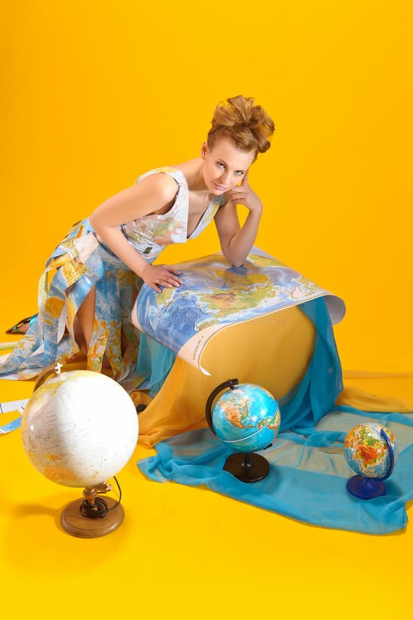 Woman with a World Map and Globes Stock Image - Image of hands, adult ...