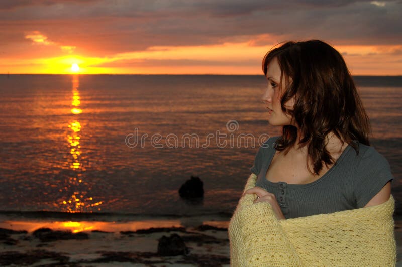 Woman Looking At Sunset Picture. Image: 109889296
