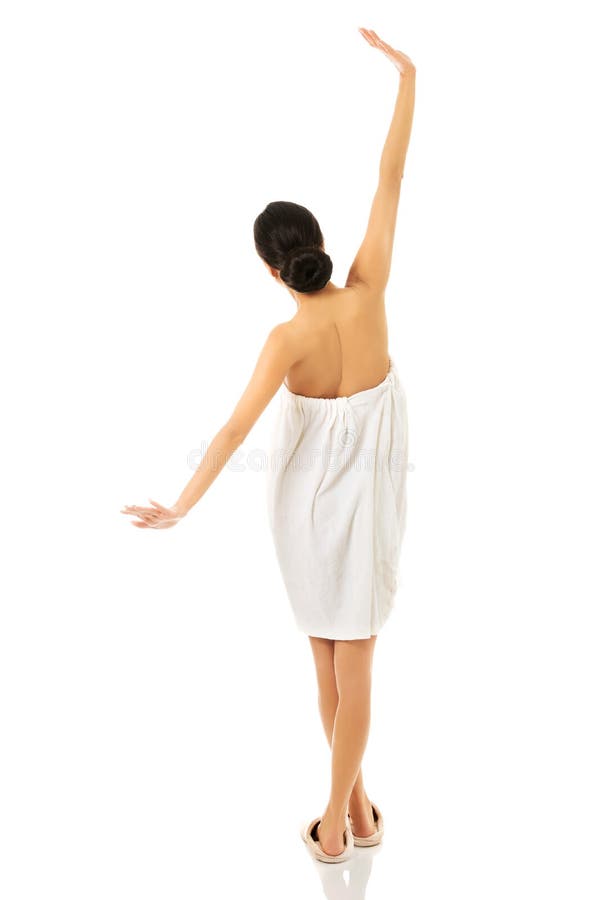 Woman Wrapped in Towel Stretching Arms Stock Photo - Image of lifestyle ...