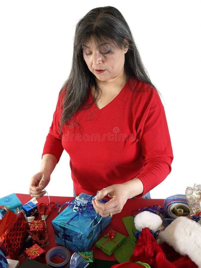 Woman Wrapping Present stock photo. Image of ribbon, holiday - 9616594