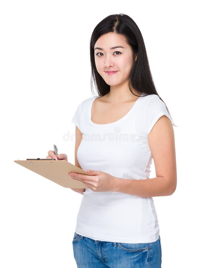 Woman write on clipboard stock image. Image of studio - 50940179