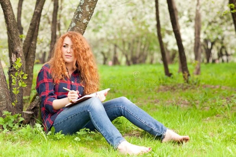 Woman writer stock image. Image of barefoot, tree, spring - 54146207