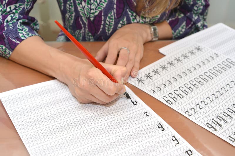 The Woman Writes Letters in Copy-books with Calligraphical Handwriting ...