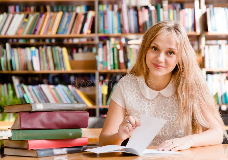 Woman Writes Notes in the Library Stock Image - Image of homework ...