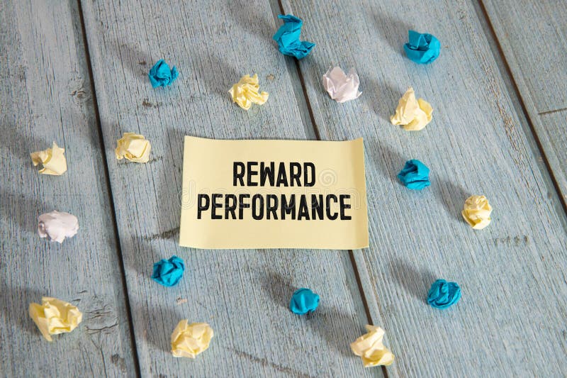 Woman Writes Text on a Notepad REWARD PERFORMANCE. Stock Image - Image ...