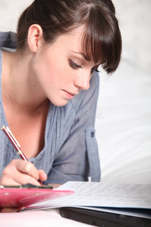 Woman writing stock photo. Image of attentive, ponytail - 25861058