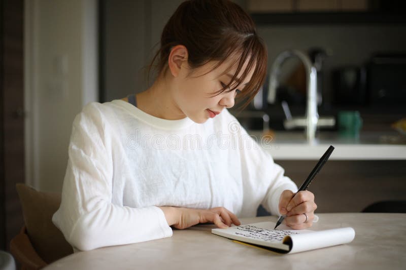A Woman Writing with a Brush Pen Stock Photo - Image of polite ...