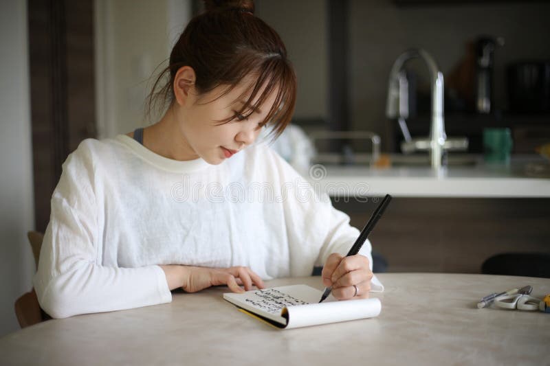A Woman Writing with a Brush Pen Stock Image - Image of writing, pretty ...