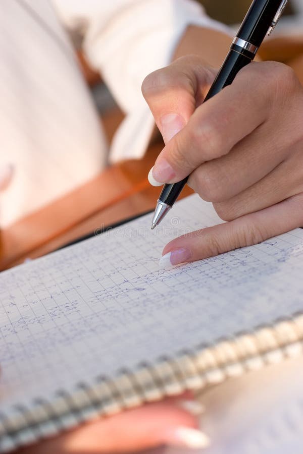 Woman Writing Down in Notebook Stock Photo - Image of financial, note ...