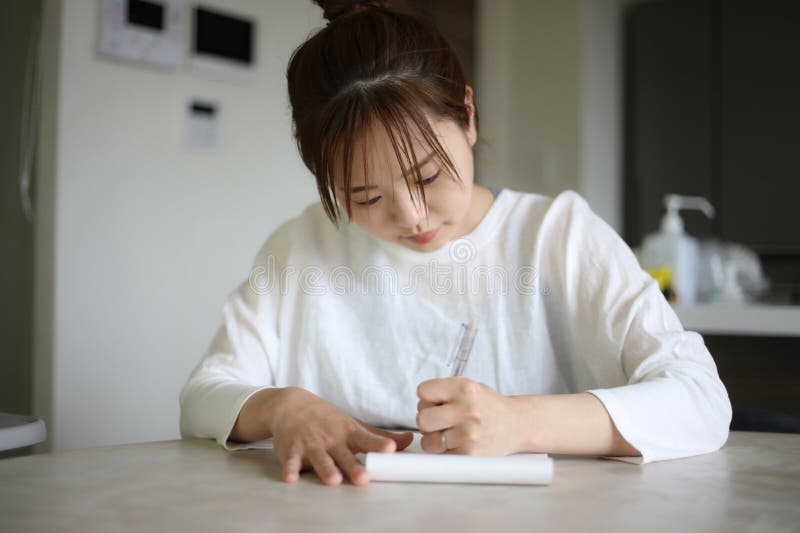 Woman writing a letter stock photo. Image of writing - 325339358