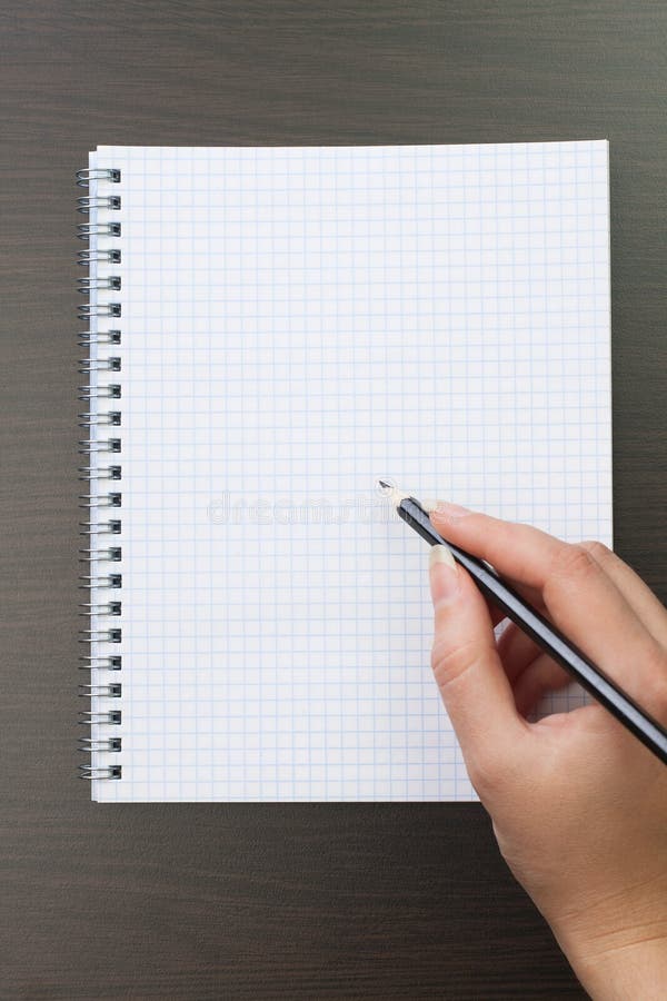 Woman writing on notebook stock image. Image of business - 25966529