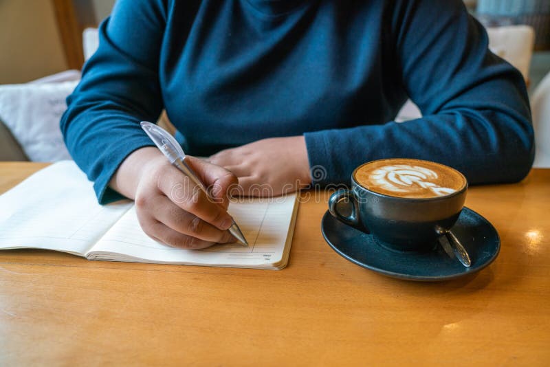 136 Woman Drinking Coffee Writing Diary Note Stock Photos - Free ...