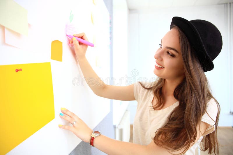 Woman writing in office stock image. Image of occupation - 55741249