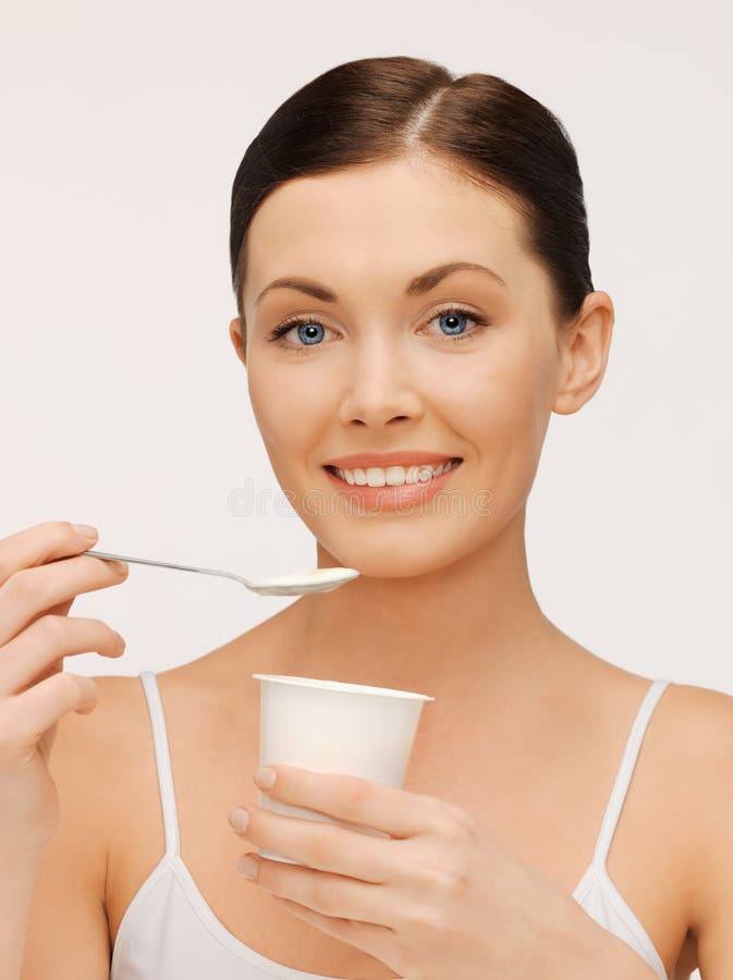 Woman with yogurt stock image. Image of casual, attractive - 36832901