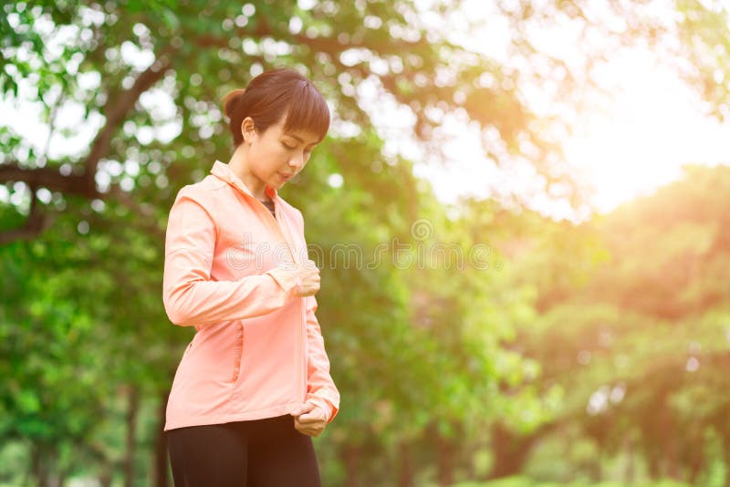 Woman Zipping Zip Up before Excercise Stock Image - Image of excercise ...