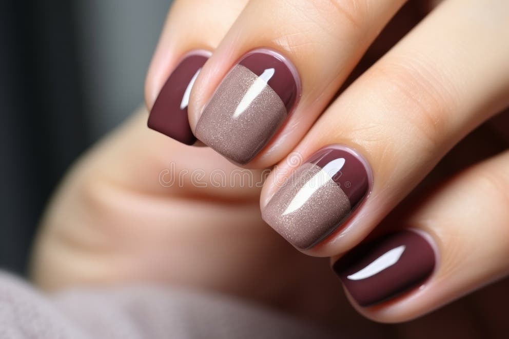 A Womans Backside Hand with a Dark Pink and Silver Manicure Stock Photo ...