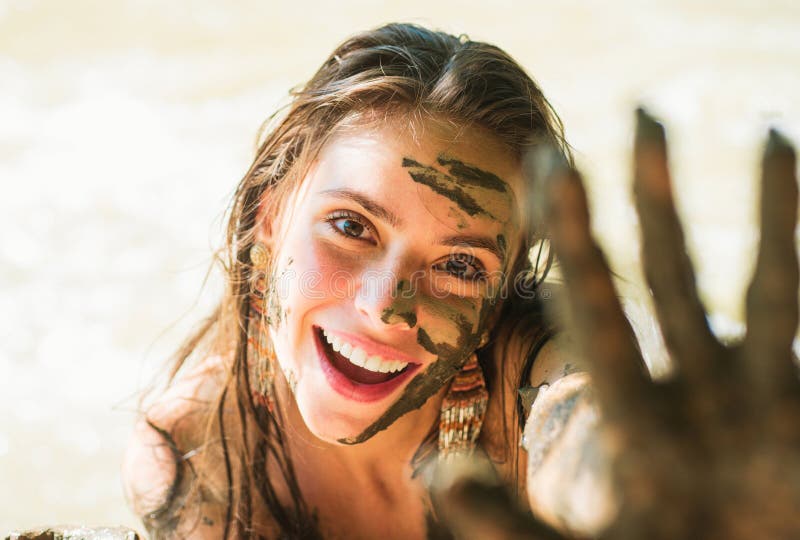 Womans Face and Hands Covered in Mud. Mud Healthy Scrub. Stock Image ...