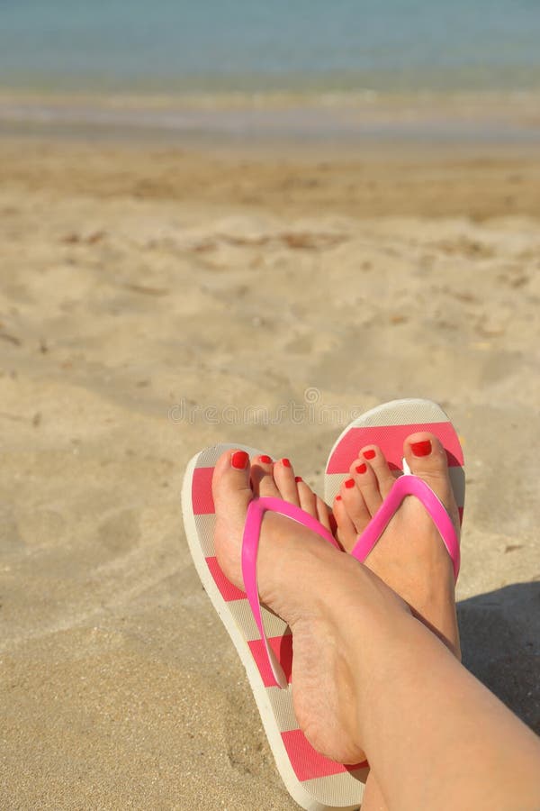 Womans Feet with Flip Flops Stock Photo - Image of body, polish: 53984036