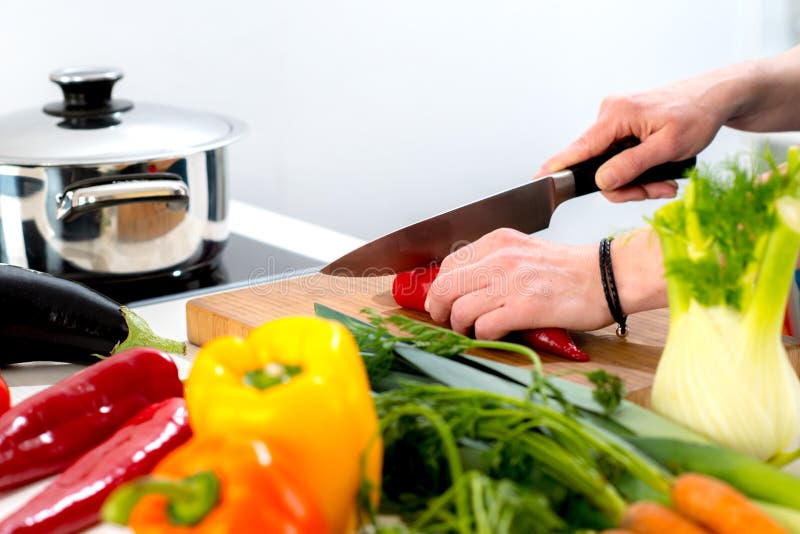 Womans Hand Cutting Vegetables Stock Image - Image of eating, cooking ...