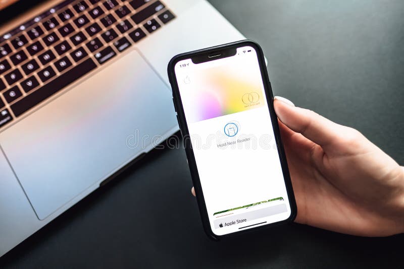 Womans Hand Holding the IPhone X with Apple Card on the Screen ...