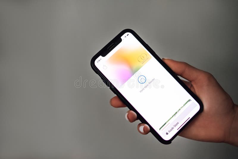 Womans Hand Holding the IPhone X with Apple Card on the Screen ...