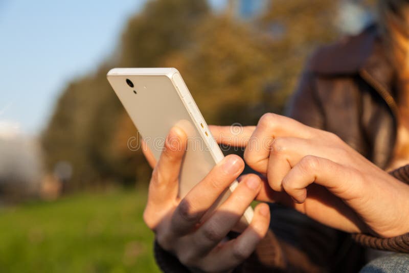 Womans Hand Holding Smartphone Stock Image - Image of cell, lifestyle ...