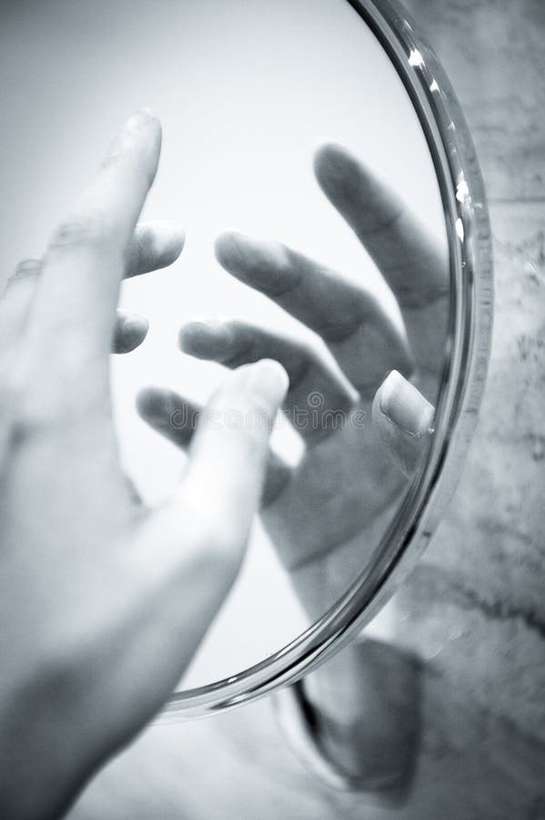 Hand Reflected in Mirror on Background of Soft Fabric with Eustoma ...