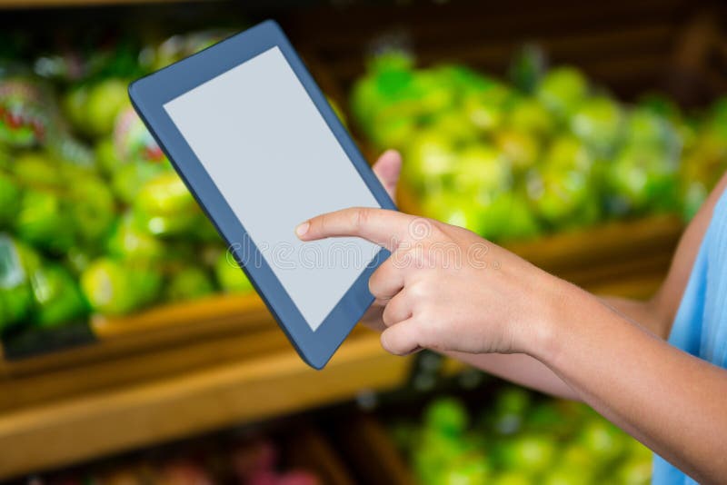 Womans hand using tablet stock image. Image of hand, standing - 64964133